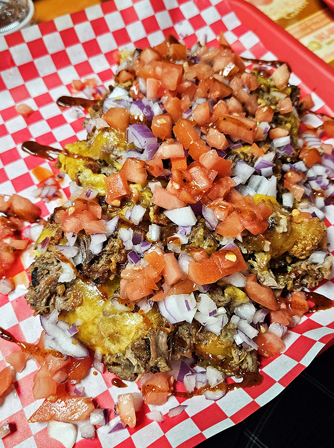 The Texas Spud comes loaded with enough toppings to qualify as its own food group. Potato? More like a canvas for BBQ artistry.