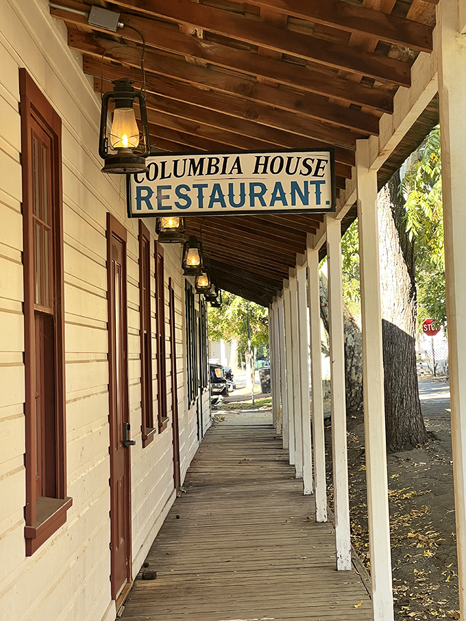 Follow the lantern-lit wooden walkway to Columbia House Restaurant, where comfort food comes with a side of historical ambiance under rustic wooden beams.