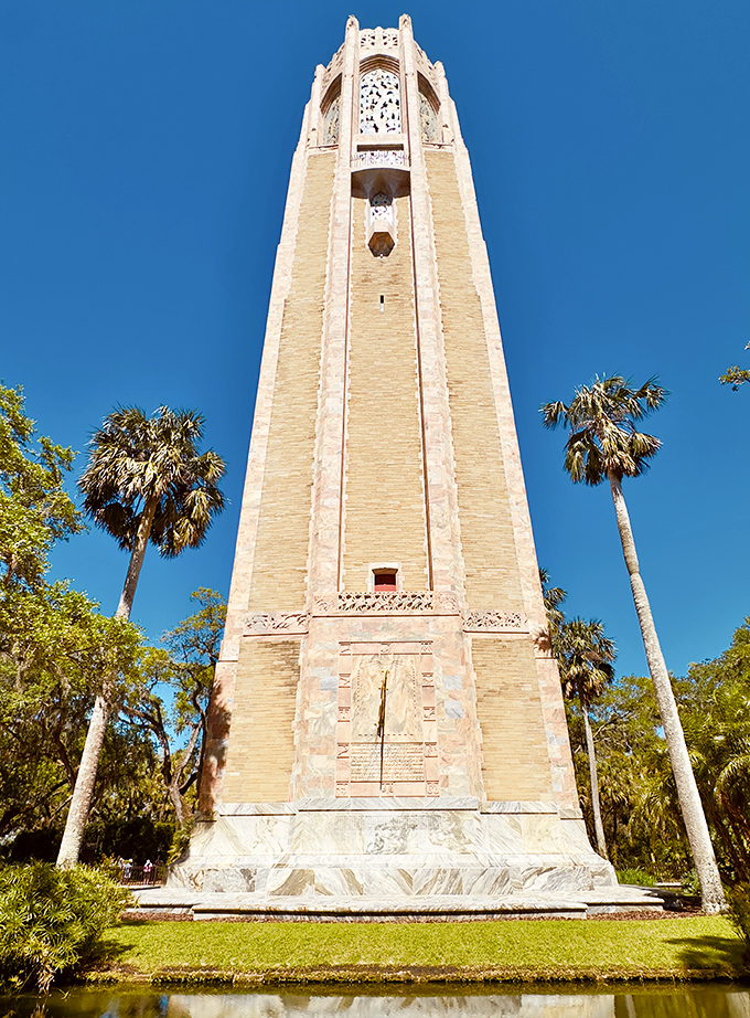 The majestic Bok Tower reaches skyward like a limestone exclamation point, announcing to visitors that yes, Florida does have elevation after all.