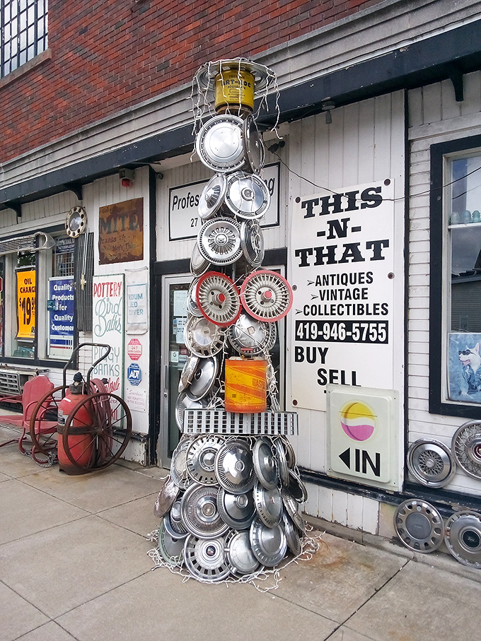 This-N-That Antiques showcases small-town ingenuity with its hubcap Christmas tree&mdash;proving one person's junk is another's roadside attraction masterpiece.