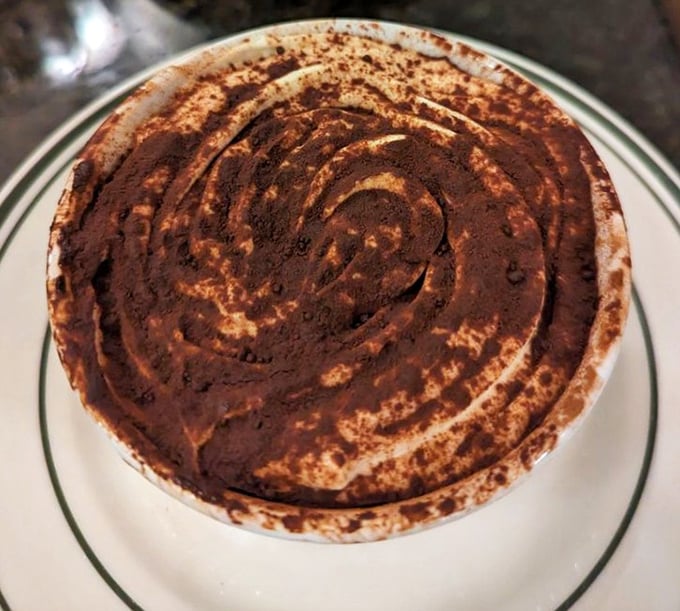 Tiramisu so perfect it looks like artwork, but tastes even better than it appears on the plate.