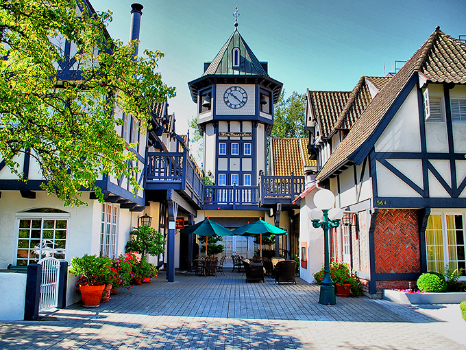 Tivoli Square's blue clock tower stands sentinel over cobblestone walkways. Time moves differently here—measured in pastry breaks rather than minutes.
