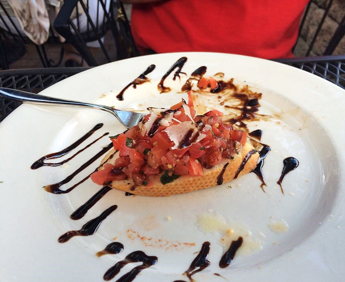Fresh bruschetta topped with diced tomatoes proves simple ingredients create extraordinary moments together.