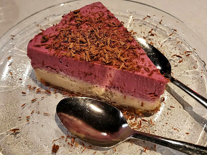 Layer upon layer of berry brilliance. This torte doesn't just satisfy your sweet tooth—it starts a philosophical debate about the nature of dessert perfection.