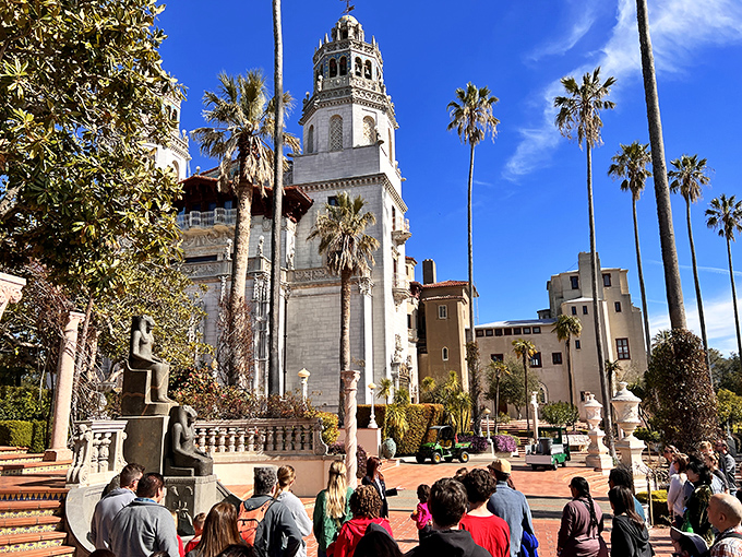 Palm trees and bell towers&mdash;California's version of "old money." The tour groups gather below like pilgrims at an altar of excess and architectural audacity.