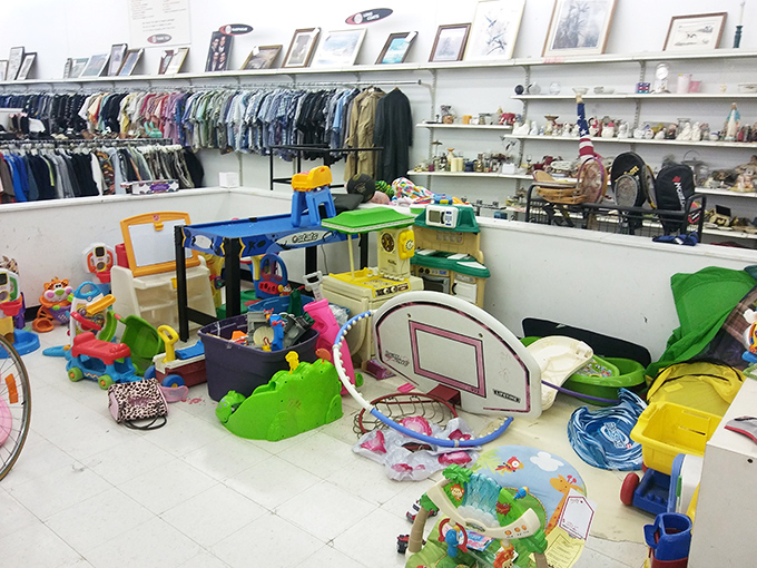 Toy paradise! One child's outgrown playthings become another's treasure in this colorful corner of childhood dreams.