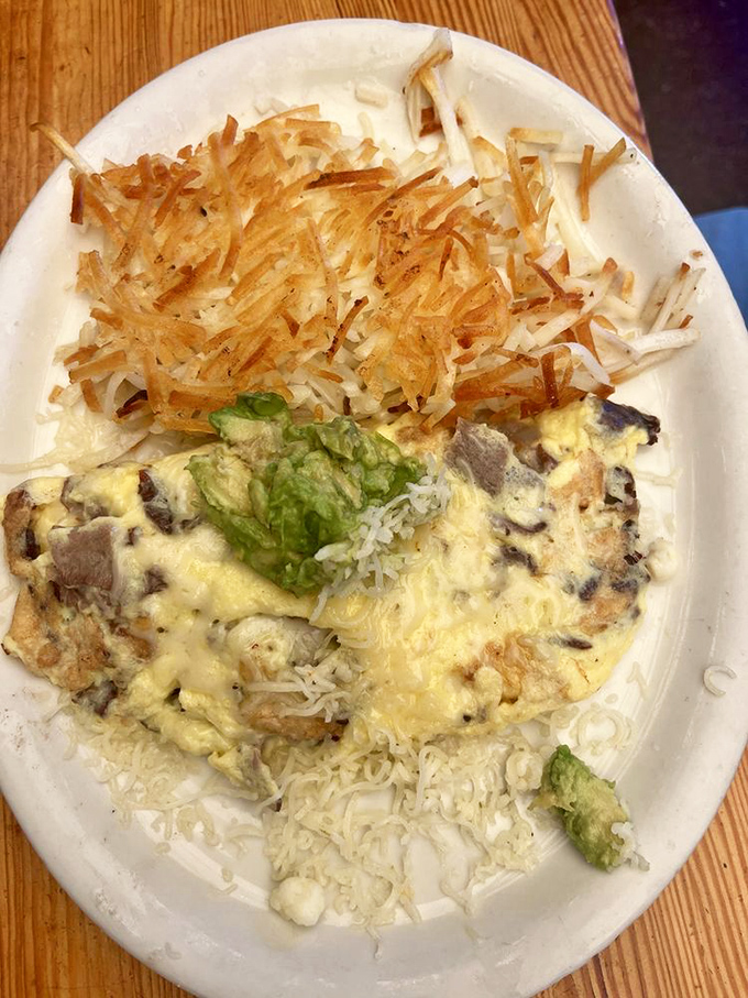 Cheese, avocado, and what looks like perfectly seasoned meat&mdash;this omelet doesn't just satisfy hunger, it conquers it with California flair.