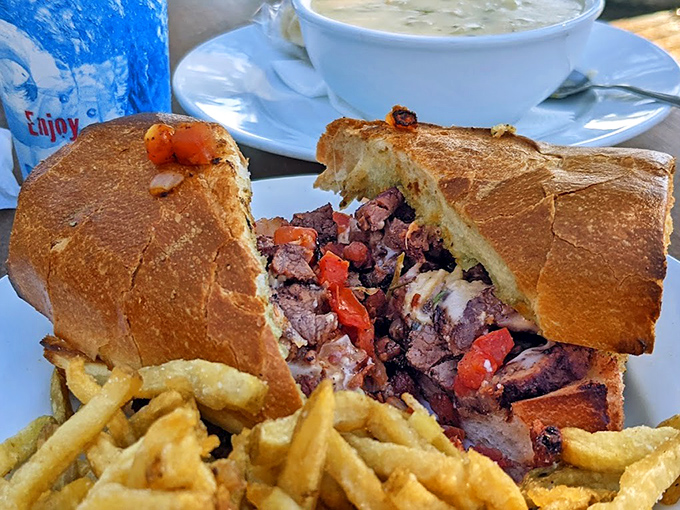 A tri-tip sandwich that makes other sandwiches question their life choices, paired with fries that achieve that perfect crisp-to-fluffy ratio.