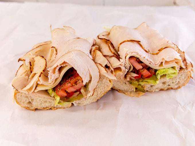 Thinly sliced turkey piled higher than your weekend to-do list. Fresh veggies add color to this masterpiece of lunchtime engineering.