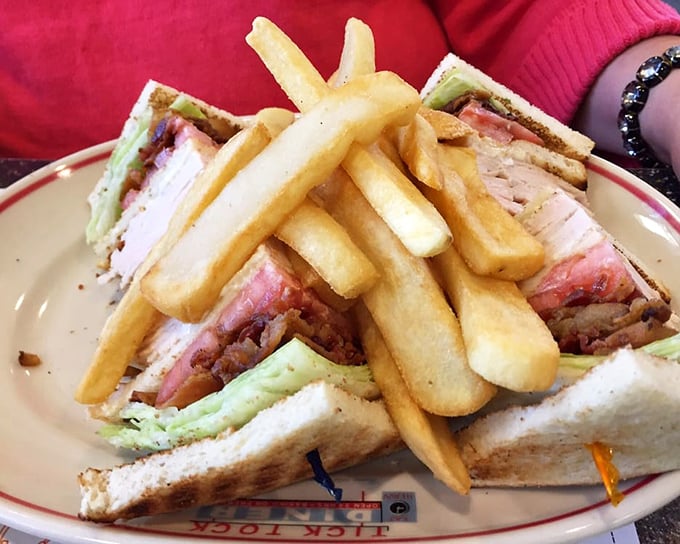 The club sandwich&mdash;architecture you can eat, where each layer is perfectly positioned between toast triangles that somehow hold the whole beautiful mess together.