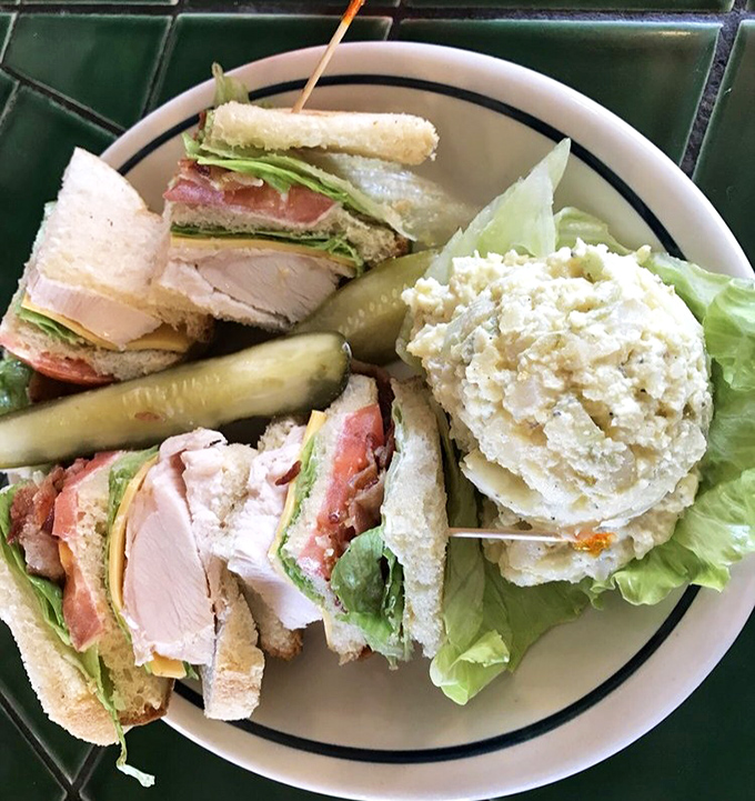 The club sandwich that makes you wonder why anyone bothers with just two pieces of bread.