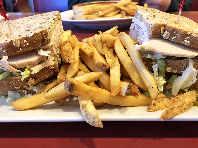 A turkey club sandwich that's built like a skyscraper and tastes like pure comfort.