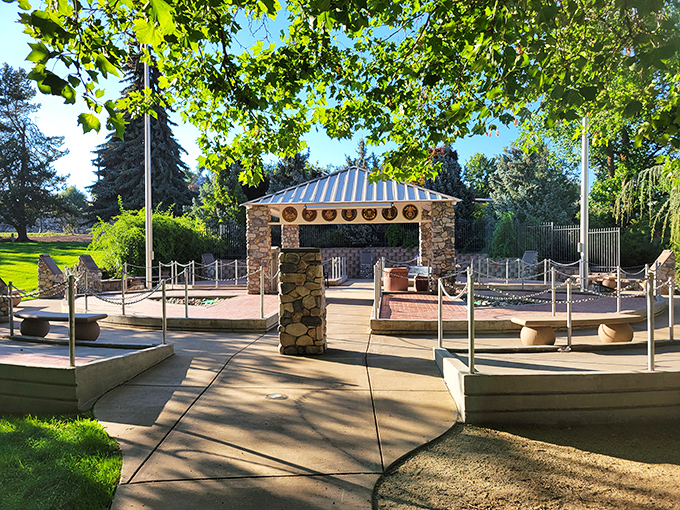 The Veterans Memorial Park pavilion – where community concerts happen without requiring binoculars or second mortgages for decent seats.