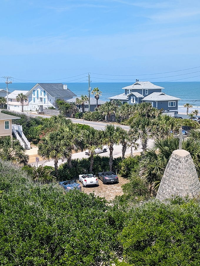 From Castle Otttis, the Atlantic Ocean and beach houses create a surreal backdrop—medieval Ireland meets Florida retirement dreams.