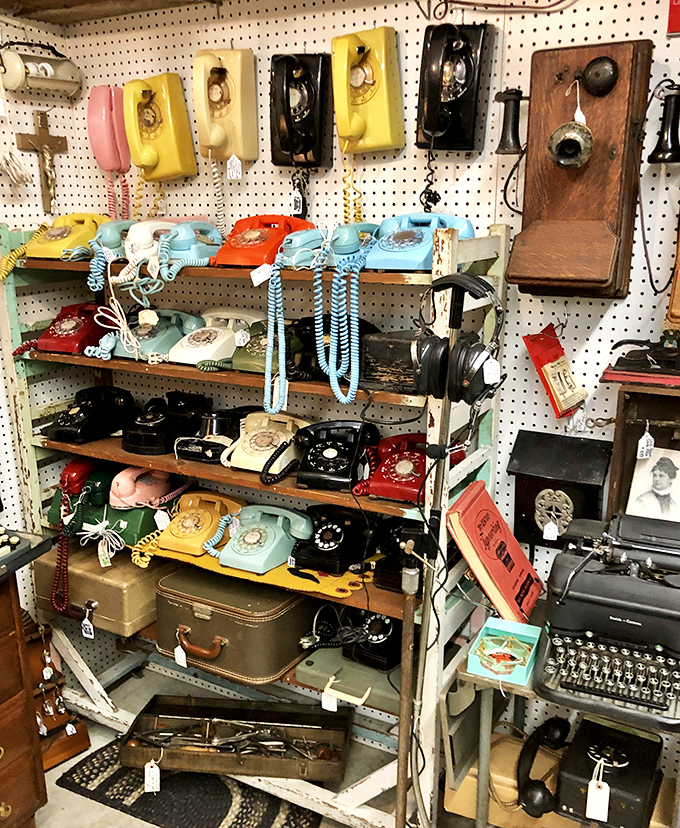 The wall of vintage telephones tells the evolution of communication&mdash;from "Number please?" to "Can you hear me now?" in one nostalgic display.