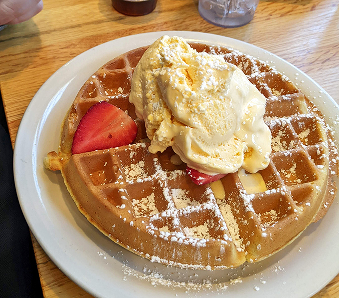 A waffle that understands its purpose in life: to be golden, crisp, and the perfect vehicle for butter, syrup, and a dollop of whipped cream.