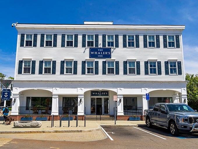 The Whaler's Inn stands as a testament to New England architectural restraint&mdash;white clapboard, black shutters, and nautical vibes that whisper "seaside elegance."