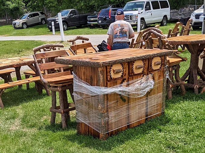 Rustic craftsmanship meets woodland charm in this handmade furniture display. Paul Bunyan would approve of these conversation pieces.