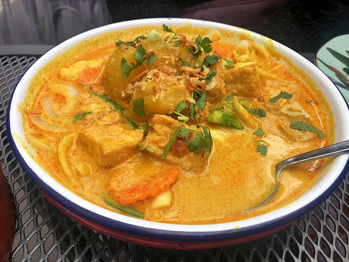 This yellow curry doesn't just sit in the bowl&mdash;it beckons, promising comfort and complexity in equal measure, like a warm hug with a surprising twist.