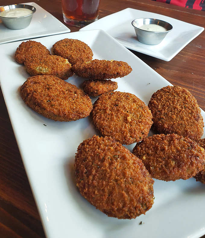Golden-brown zucchini chips that have achieved that mythical balance between healthy vegetable and irresistible snack food. Diet plans, beware!