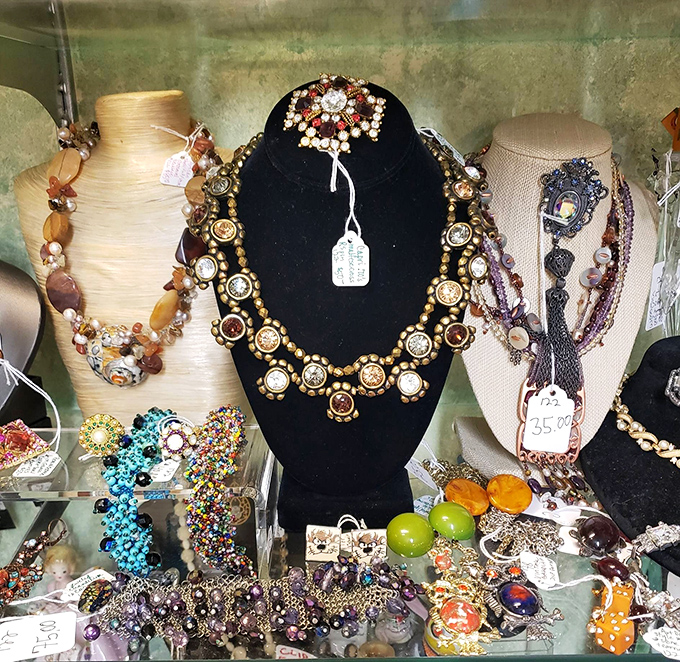 Jewelry displays that sparkle with the glamour of decades past, each piece telling untold stories.