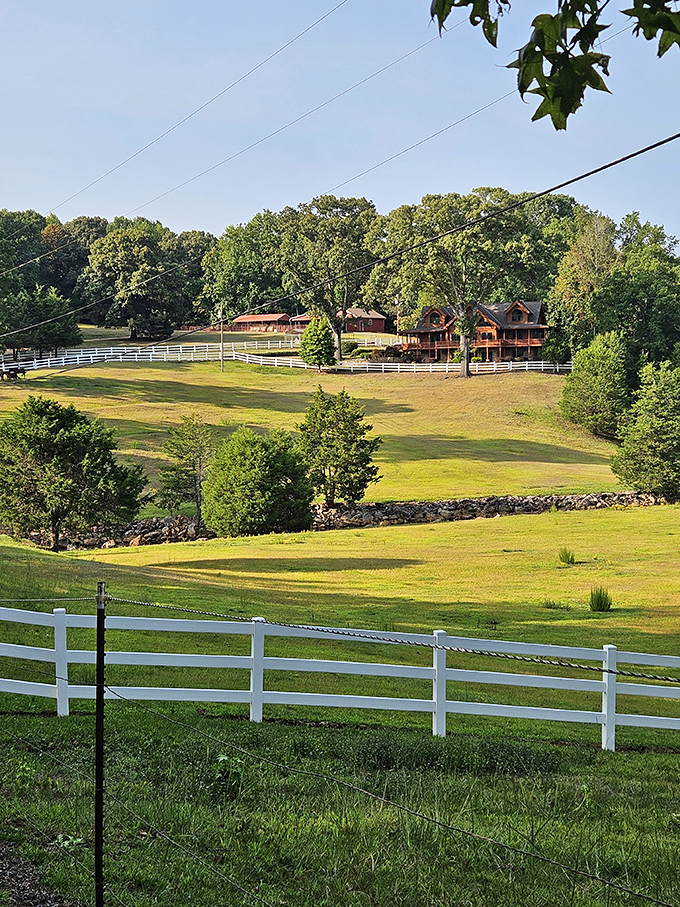 Rolling meadows and white fences frame the pastoral landscapes surrounding Paris Mountain, a reminder of the area's agricultural heritage.