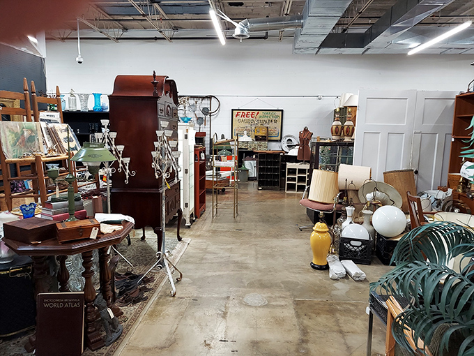 Antique cabinets displaying vintage canisters&mdash;because your flour deserves more glamorous housing than that plastic container from Target.