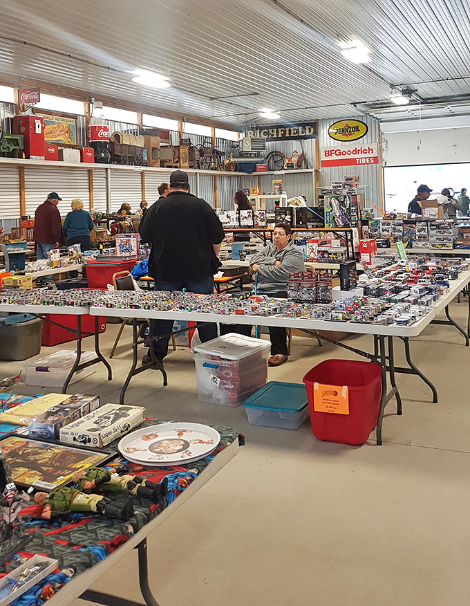 Rustic wooden tables laden with cardboard boxes—the universal sign language for "dig here, treasures below!"