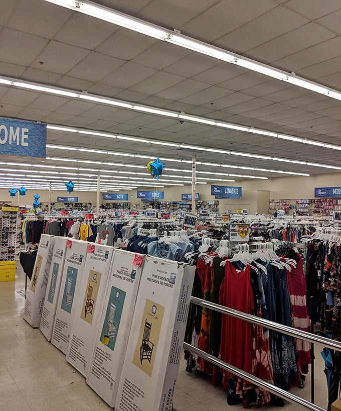 Blue star balloons hover above racks of clothing like retail constellations, guiding shoppers through a universe of affordable fashion options.