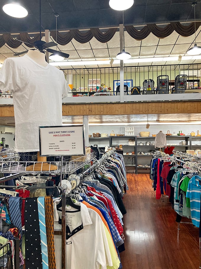 The men's clothing section, meticulously organized with prices that'll make you wonder if you've time-traveled to 1995.