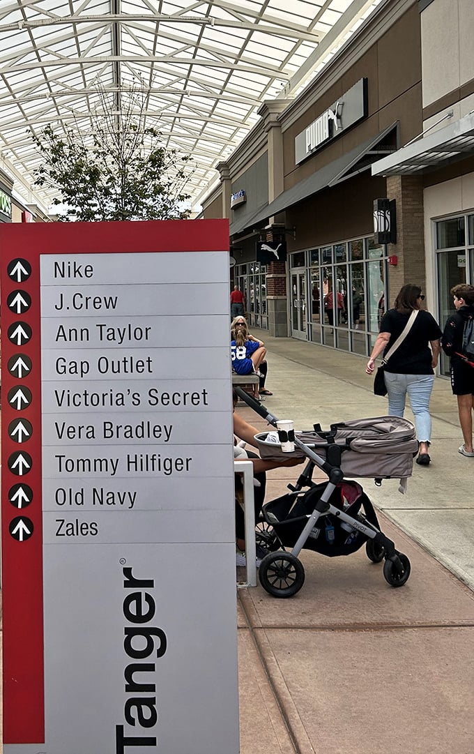 The directional signs serve as your retail treasure map, guiding you to your next great find with arrow-pointed precision.