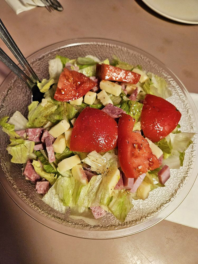The antipasto salad&mdash;where vegetables pretend they're the star until you realize they're just opening acts for the pizza.