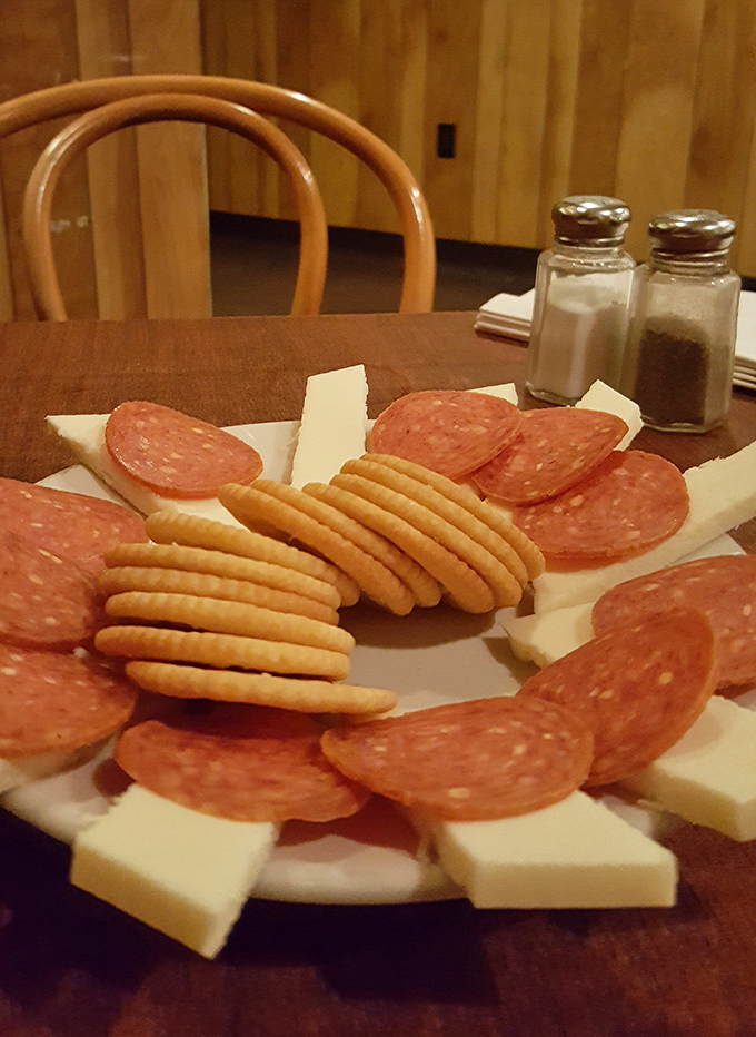 The pepperoni and cheese plate doesn't need to show off&mdash;it knows exactly what it is: the perfect companion to cold beer.