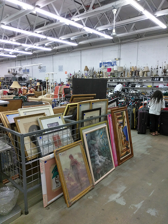 Art in limbo&mdash;framed memories and creative expressions waiting for the perfect wall in someone else's story.