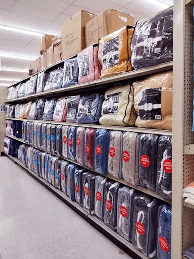 Bedding bonanza! High thread-count dreams stack floor to ceiling, turning luxury sleep into an affordable reality.