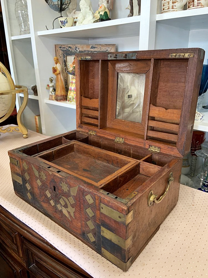 This isn't just a wooden box—it's a time capsule with brass fittings and hidden compartments that's begging to hold your modern secrets.
