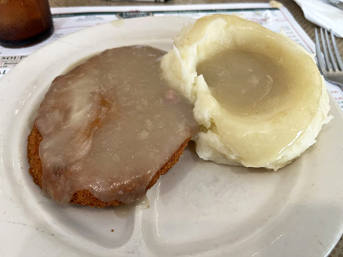 This breaded veal cutlet doesn't just share the plate with mashed potatoes&mdash;they're practically in a committed relationship. A marriage of flavors made in comfort food heaven.