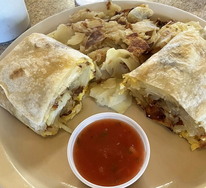 The breakfast burrito at Tallyrand doesn't need a fancy name or fusion twist. It just needs to be exactly this good.