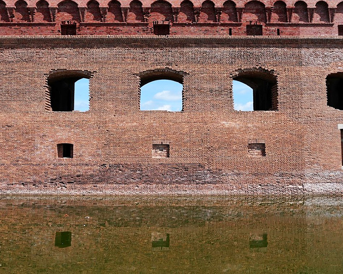Brick by brick, history rises from the sea. These weathered walls have withstood hurricanes, salt air, and thousands of tourist selfies for over 150 years.