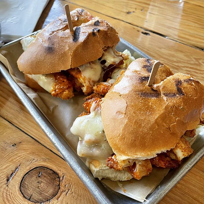 A sandwich that answers the eternal question: "What if clouds were made of fresh fish and crusty bread?" Melted cheese cascades like a delicious waterfall.