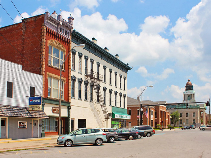 Historic buildings frame the courthouse in the distance, creating that quintessential Midwest townscape that Norman Rockwell would have appreciated.