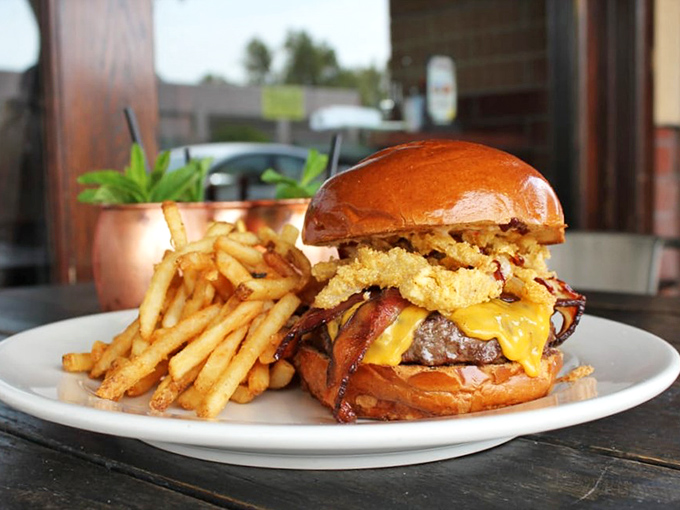 Not just a burger&mdash;it's an architectural marvel of beef, bacon, and melty cheese that requires both hands and absolutely zero dignity to consume.