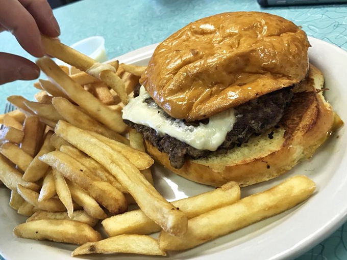 The burger and fries combo&mdash;America's most reliable relationship. This hefty specimen has all the hallmarks of a classic diner masterpiece.