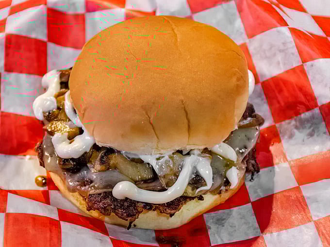 This isn't just a burger&mdash;it's edible architecture where caramelized onions and melty cheese create the perfect savory symphony.