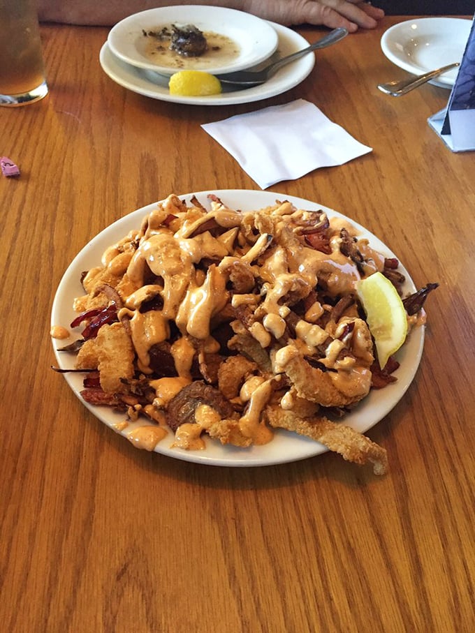 Calamari that defies the rubbery reputation of its lesser cousins&mdash;crispy, tender, and generously sauced for maximum finger-licking potential.