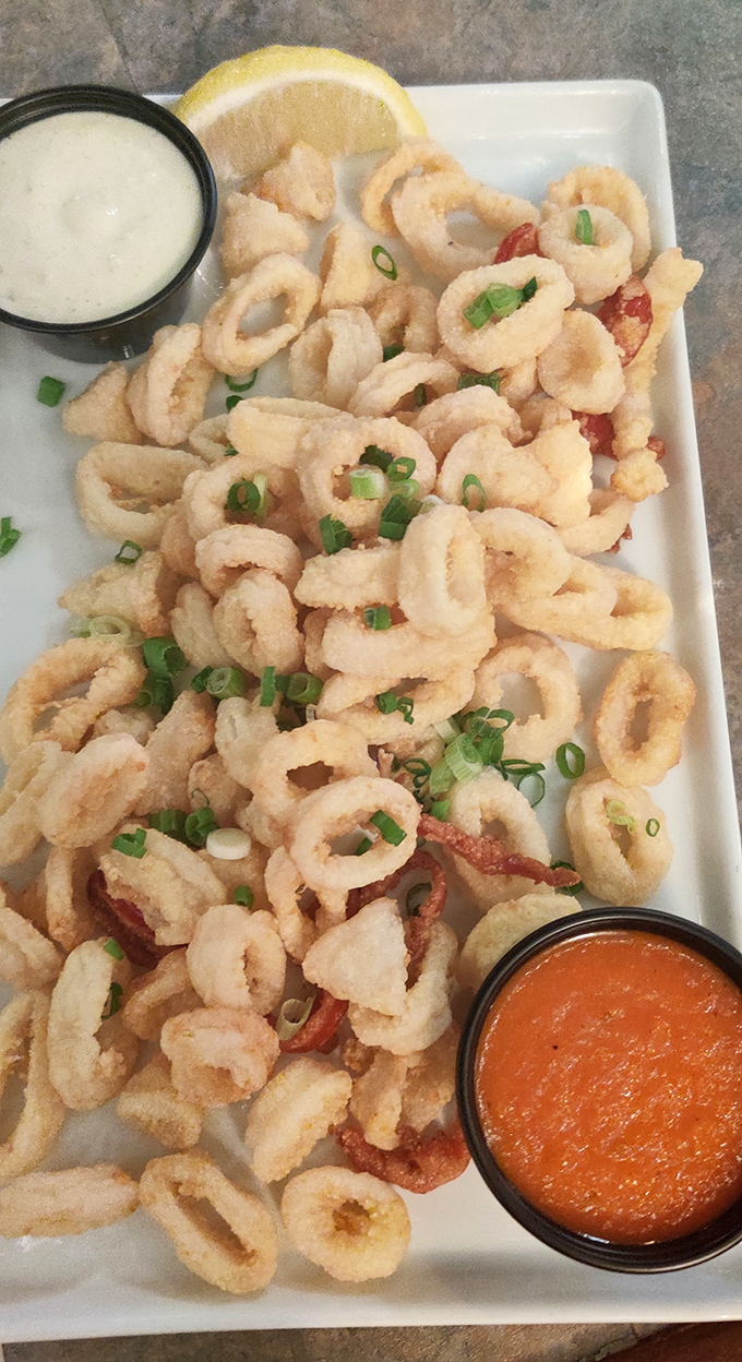 Crispy, tender calamari that would make even squid-skeptics reconsider their position. The perfect starter for your seafood adventure.