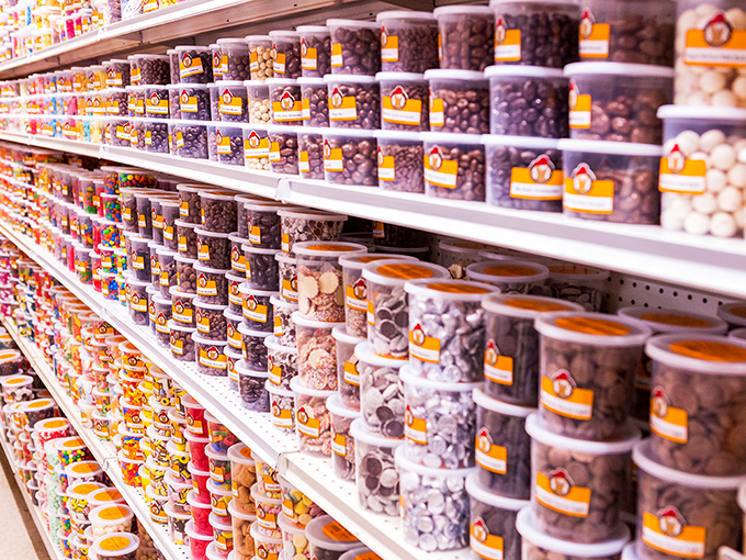 Candy containers stacked with military precision&mdash;a sugar arsenal that would make Willy Wonka himself nod in professional respect.