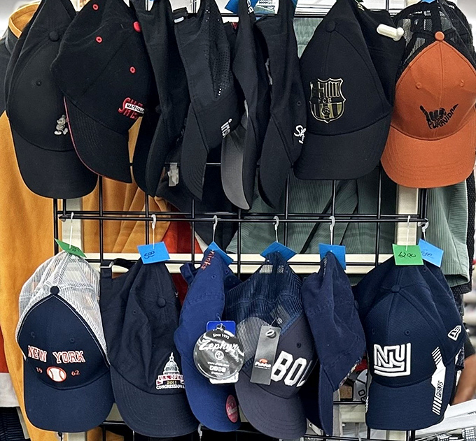 A hat collection that tells stories of team loyalties and vacation destinations. That NY Yankees cap has probably seen more drama than a Broadway show.