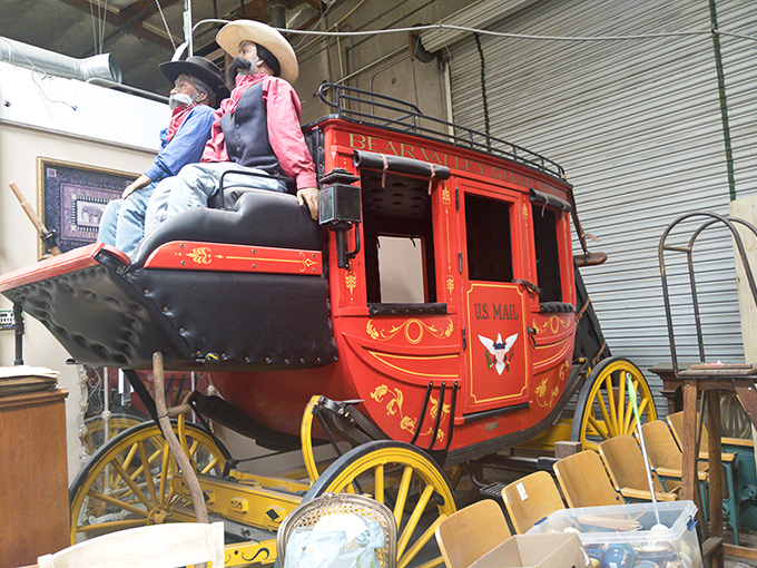 A genuine stagecoach that probably has more stories than your uncle at Thanksgiving dinner.
