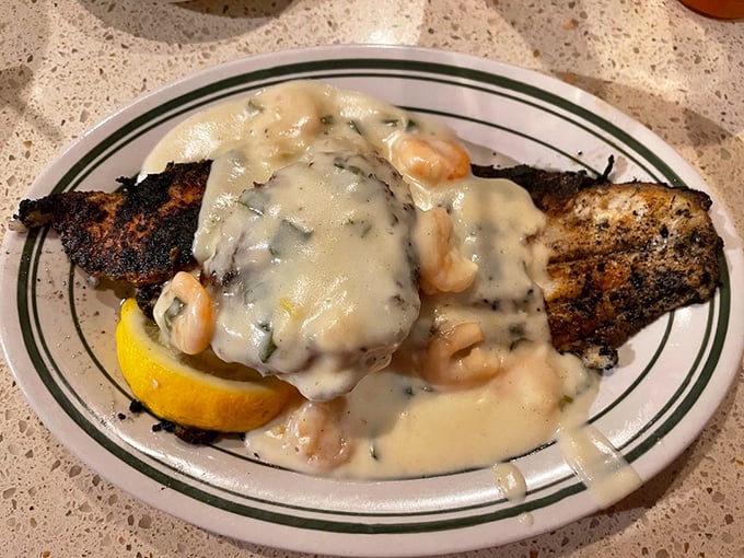 This blackened catfish swimming in cream sauce is what fish dream of becoming in their afterlife.